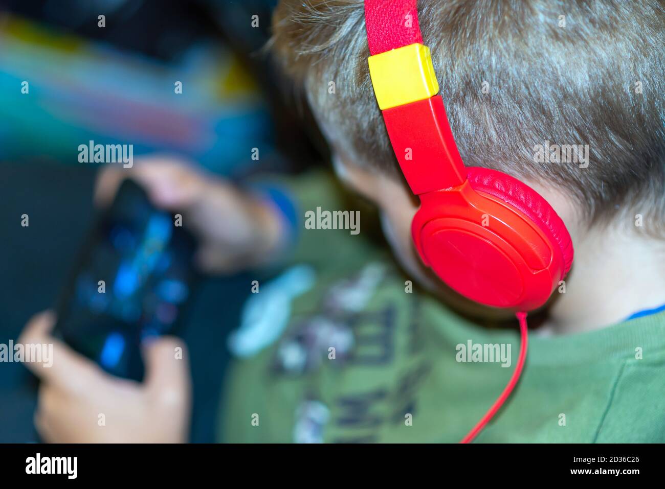 Close up top view school boy 9s calm surprised Face on Smart phone ...