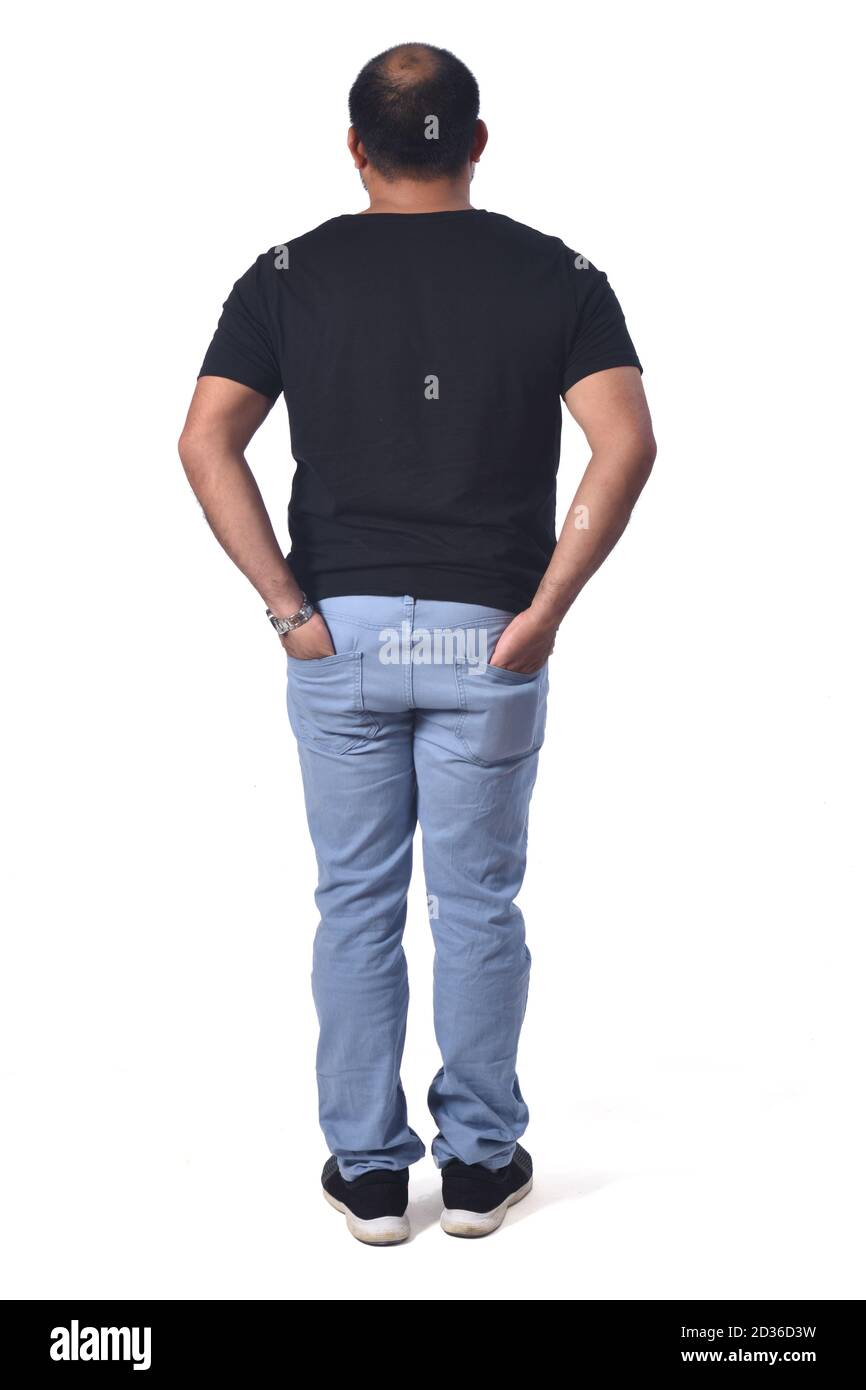 portrait of a latin man with his back with hands on pocketst on white ...