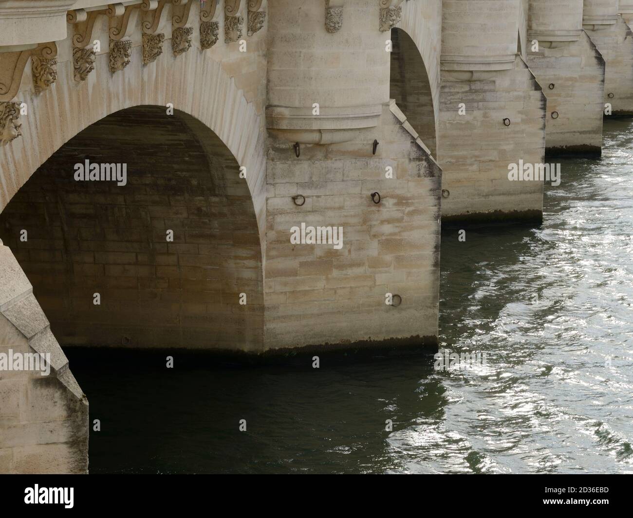 Detail of New Bridge, the oldest standing bridge across the river Seine ...