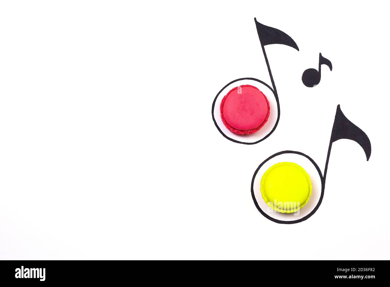 Sweet music creative background. Macaroon and hand drawn music notes on ...