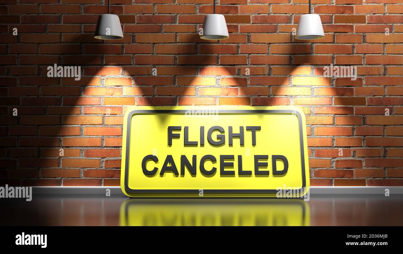 FLIGHT CANCELED message on yellow street sign leaning at bricks wall ...
