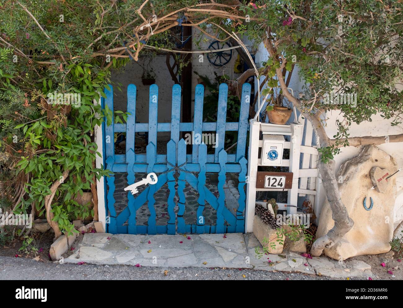 Ornate blue gate, no 124, near Latchi Cyprus Stock Photo - Alamy