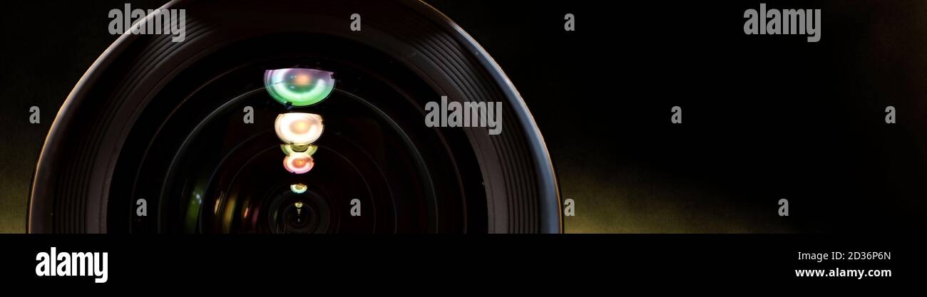 Optical partial sight. Reflection in the photo, camera on black ...