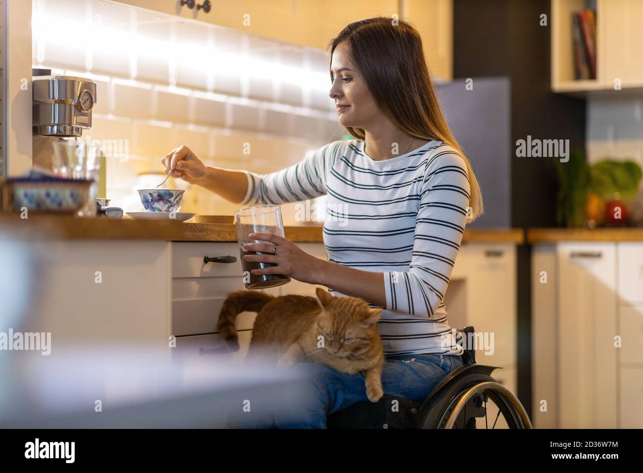 Disabled woman cooking hi-res stock photography and images - Alamy
