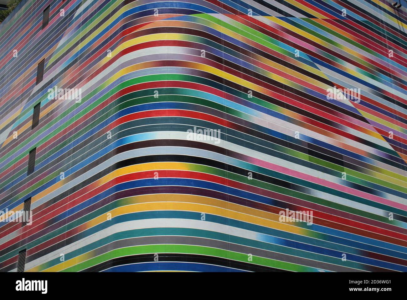 Colorful facade of a building with stripes Stock Photo - Alamy