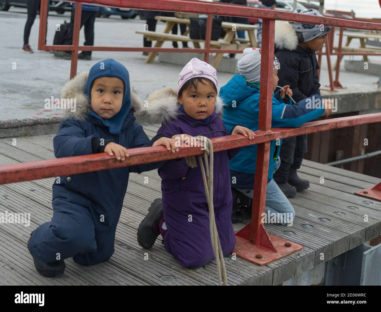 Inuit children on a boardwalk, Nuuk, Sermersooq, Greenland Stock Photo ...