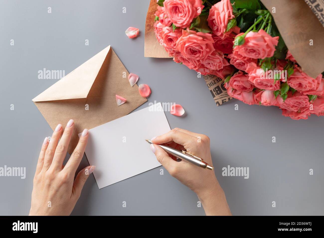 Woman writing birthday card hi-res stock photography and images - Alamy