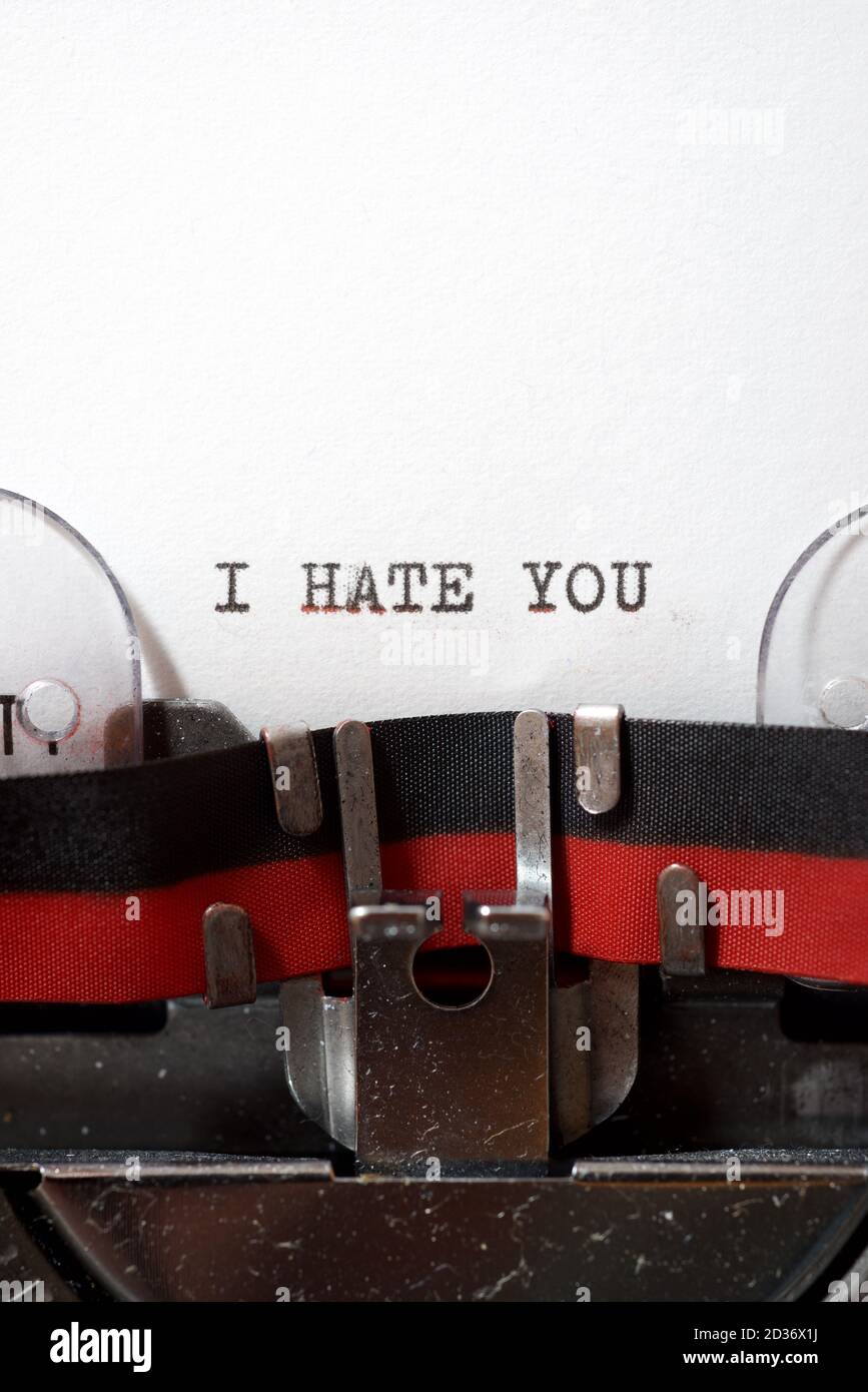I hate you phrase written with a typewriter Stock Photo - Alamy