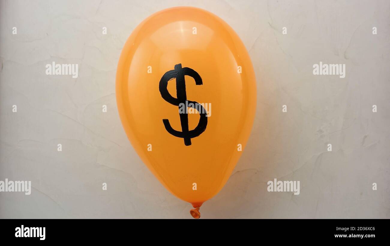 Golden balloons with dollar sign Stock Photo - Alamy