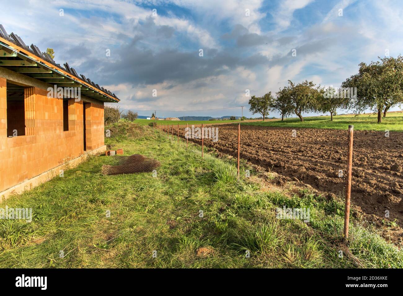 Construction of a family house in the village. Empty construction site ...