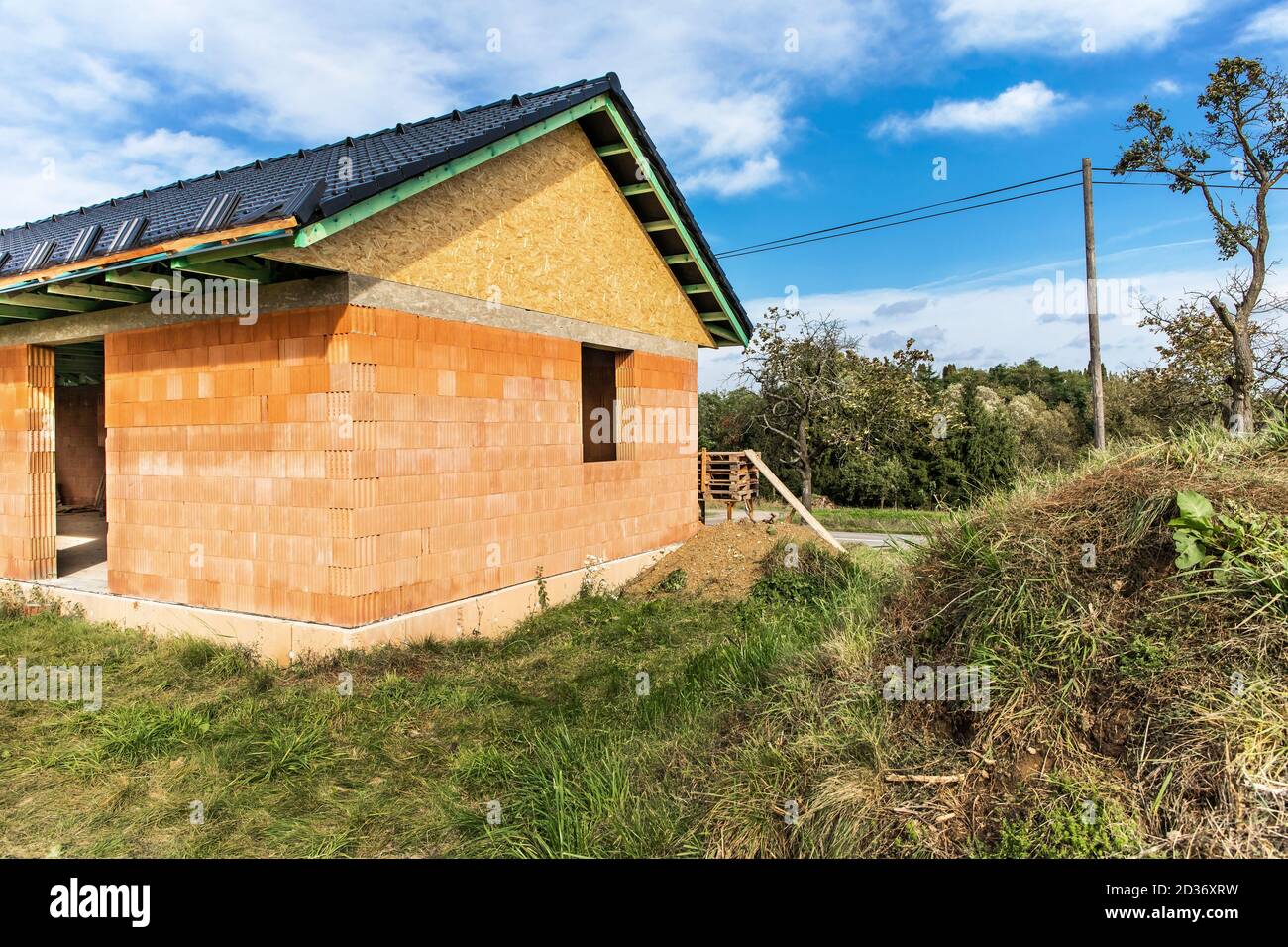 Construction of a family house in the village. Empty construction site ...