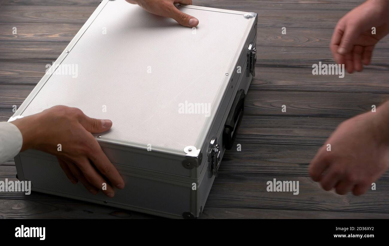 Open silver briefcase full dollar hi-res stock photography and images ...