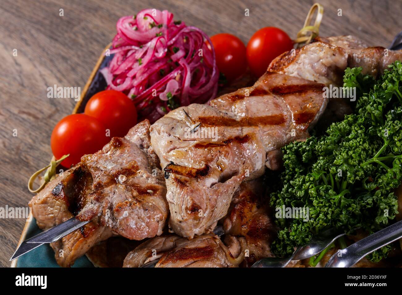 Grilled chicken and pork barbeque Stock Photo - Alamy