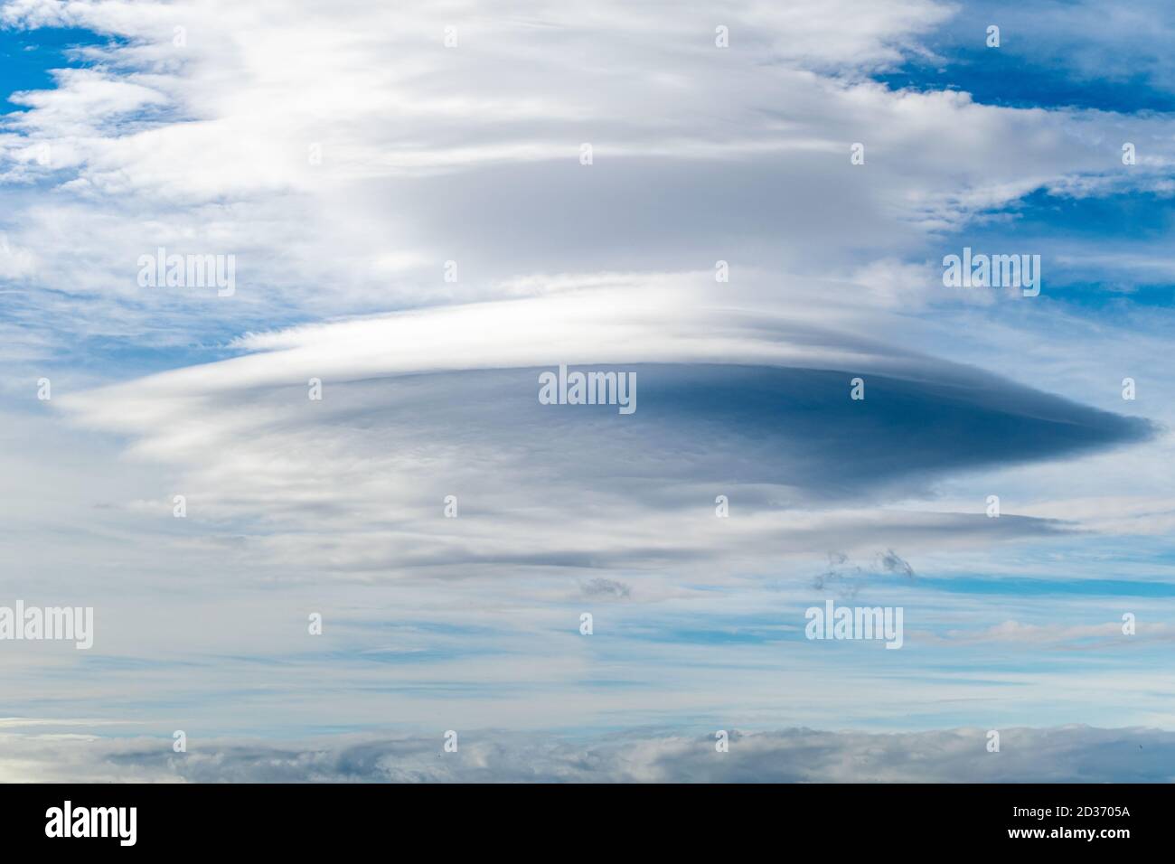 a grey disk shaped Cumulonimbus cloud over the Mediterranean Stock ...