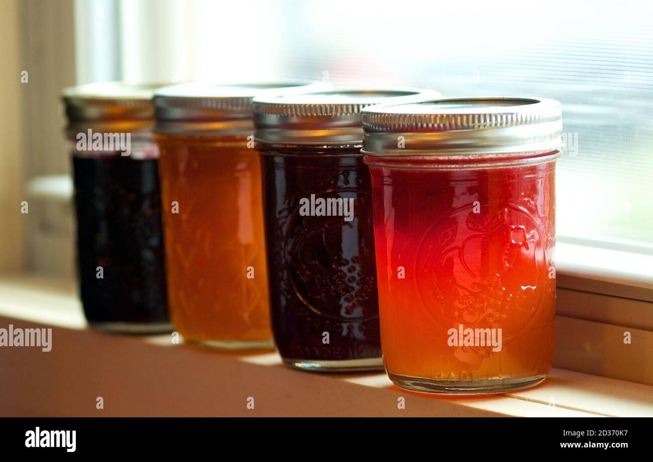 Jars of homemade jam on window sill Stock Photo - Alamy