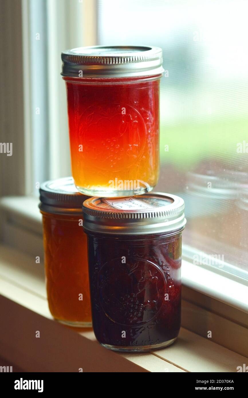Jars of homemade jam on window sill Stock Photo - Alamy