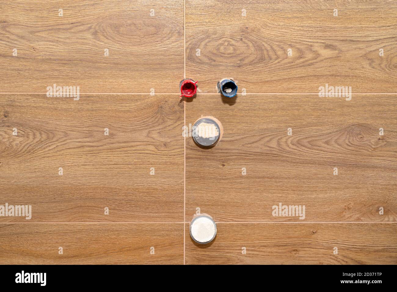 Double water pipe and sewer pipe coming out of the wall in a modern ...