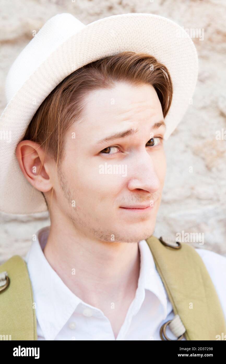 Man smiles looking camera sitting hi-res stock photography and images ...