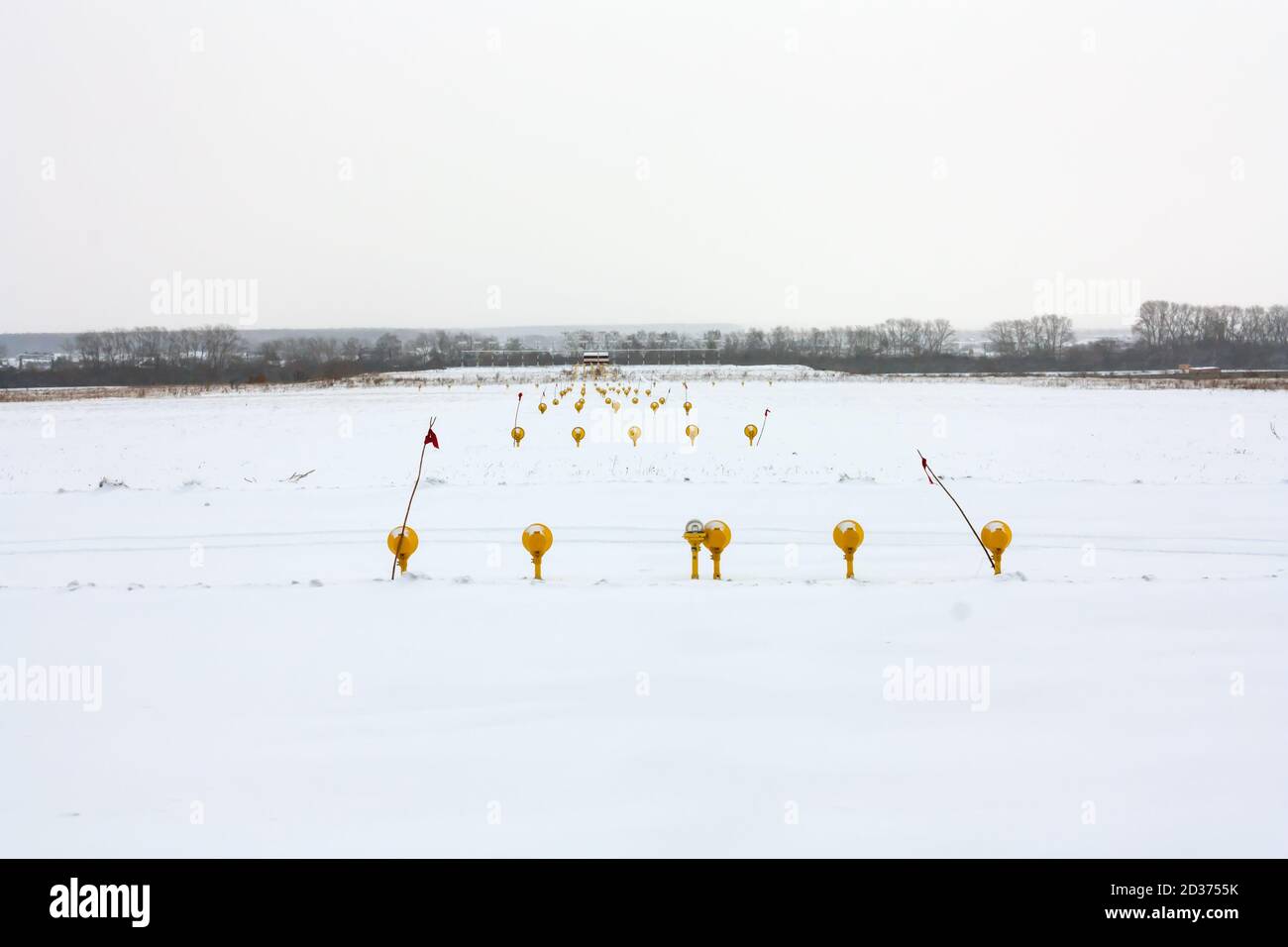 Approach lights of the winter airport runway from the back side Stock ...