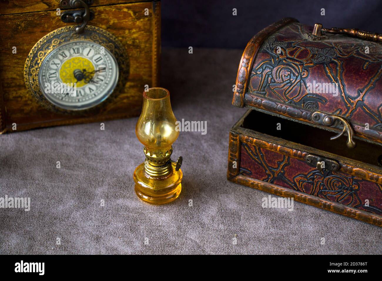 Vintage objects on the table, old box and lamp Stock Photo - Alamy