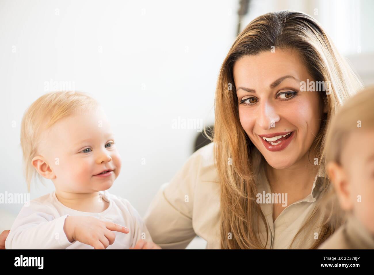 Portrait of beautiful mother and little girl. Family values Stock Photo ...