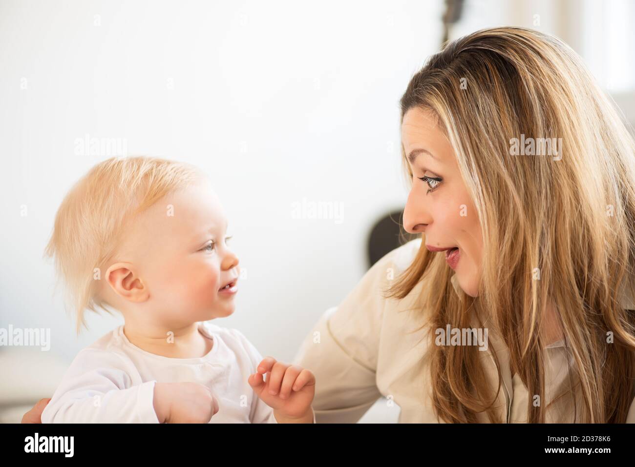 Portrait of beautiful mother and little girl. Family values Stock Photo ...