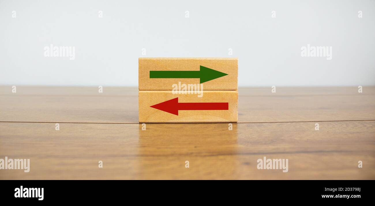 Conceptual image of choice and direction. Wooden blocks with arrows ...