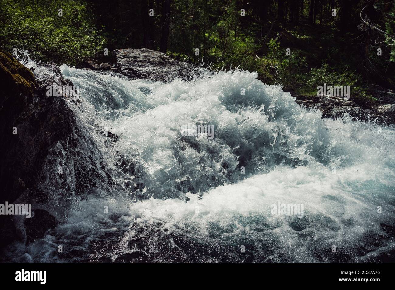 Big rapids of powerful mountain river. Beautiful background with azure ...