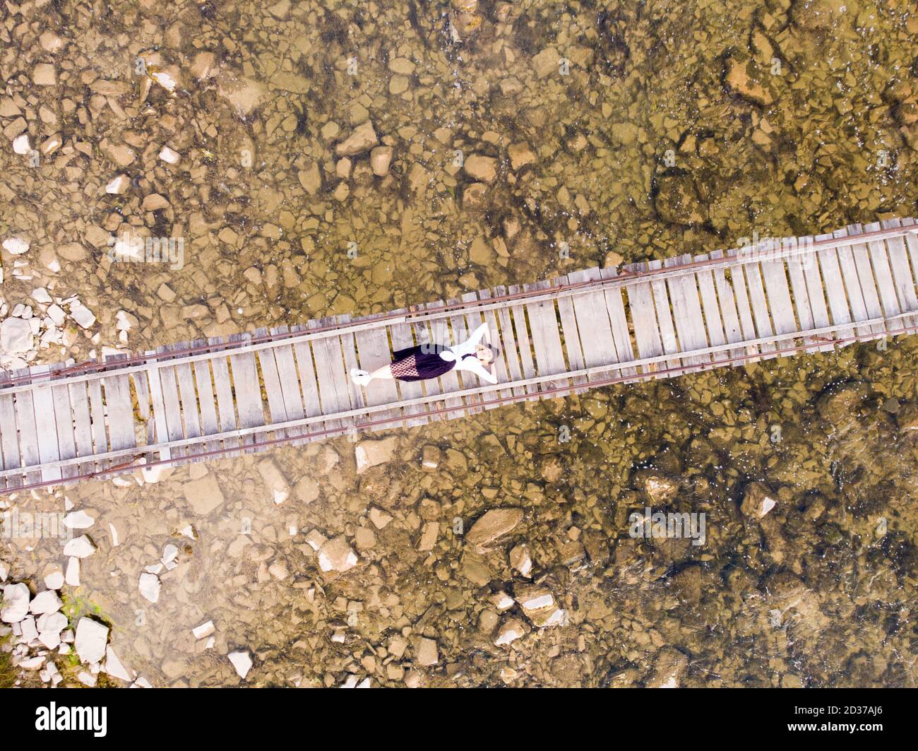 Woman laying down top view hi-res stock photography and images - Alamy