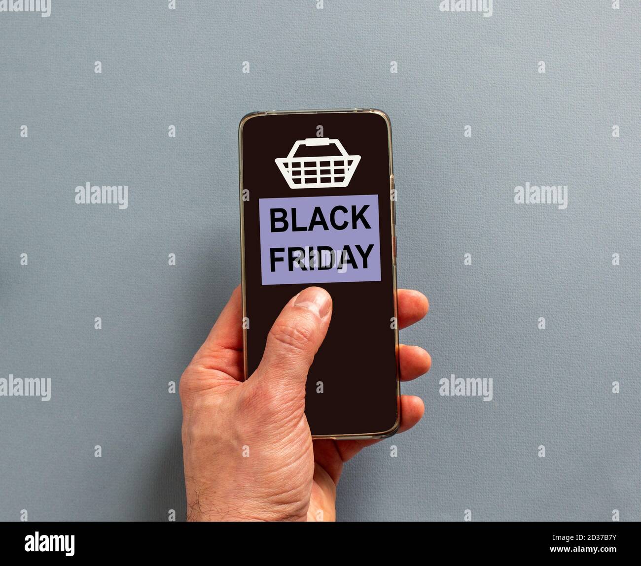 Male finger clicks on smartphone screen with words 'black friday' on ...