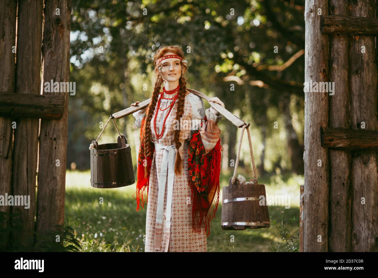 Beautiful Slavic girl with long blonde hair and brown eyes in a white ...