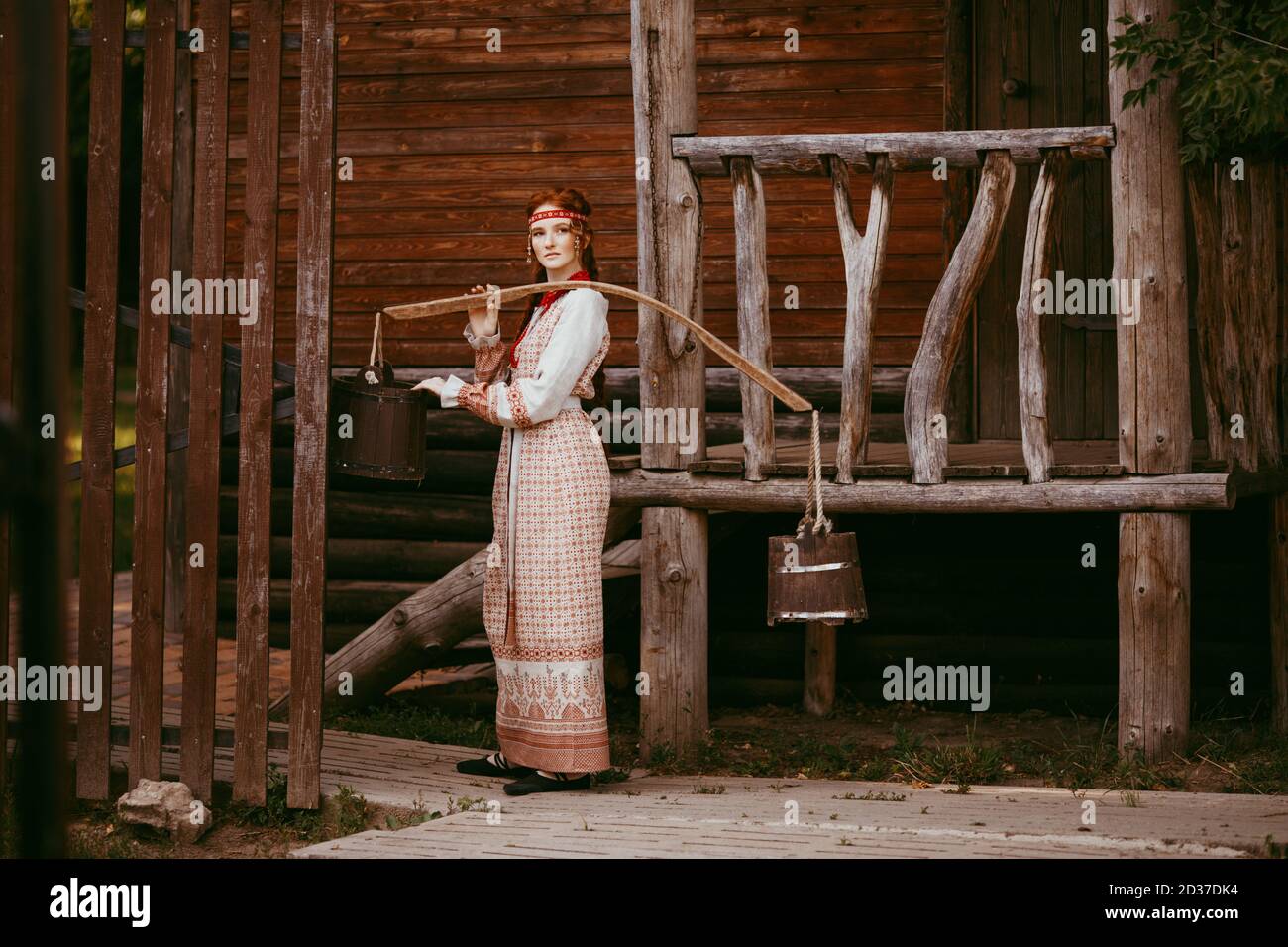 Beautiful Slavic girl with long blonde hair and brown eyes in a white ...