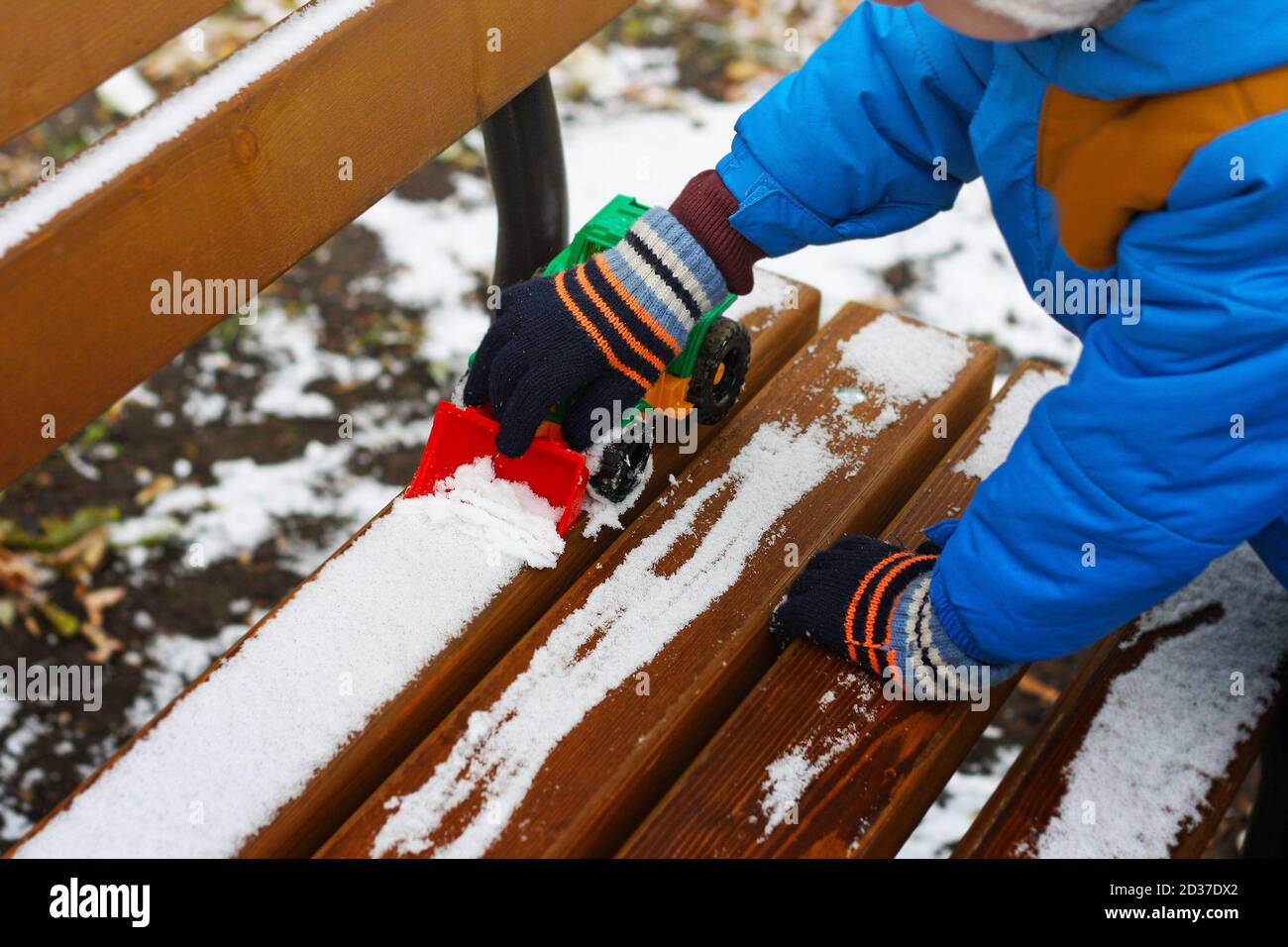 A child plays with a typewriter with the first snow Stock Photo - Alamy