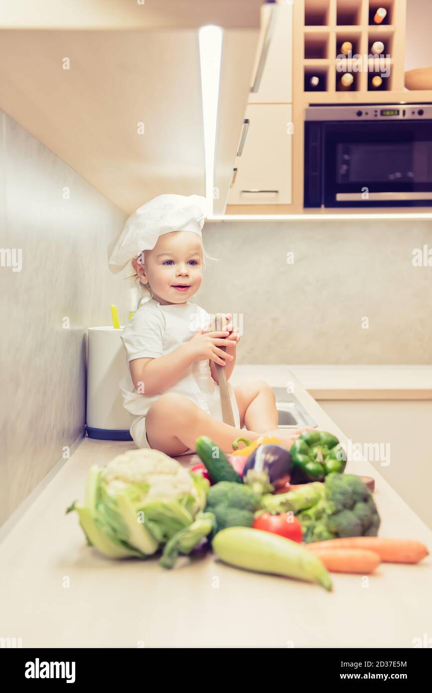 Baby kitchen funny hi-res stock photography and images - Alamy