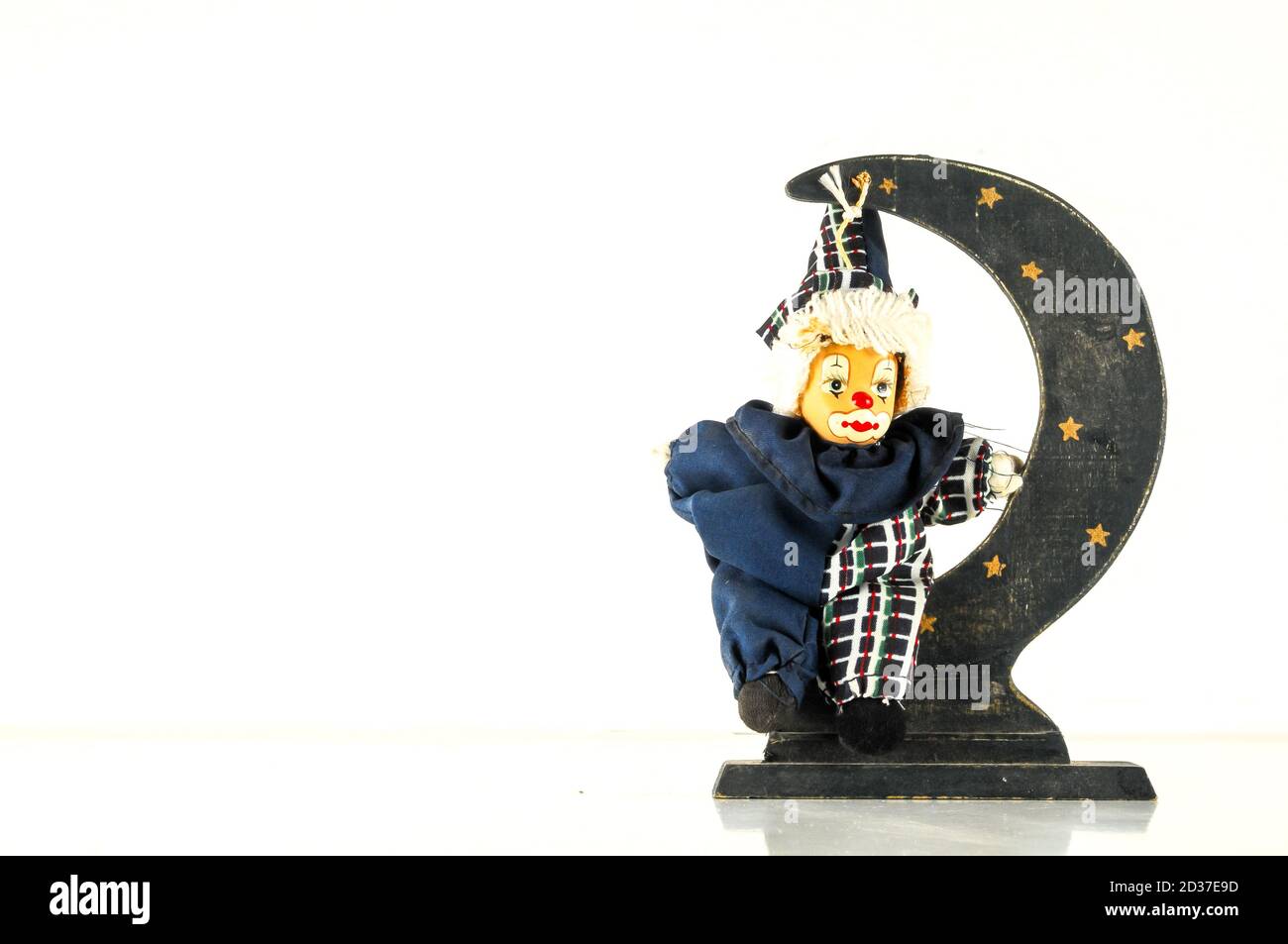 Pierrot toy doll on white background Stock Photo - Alamy