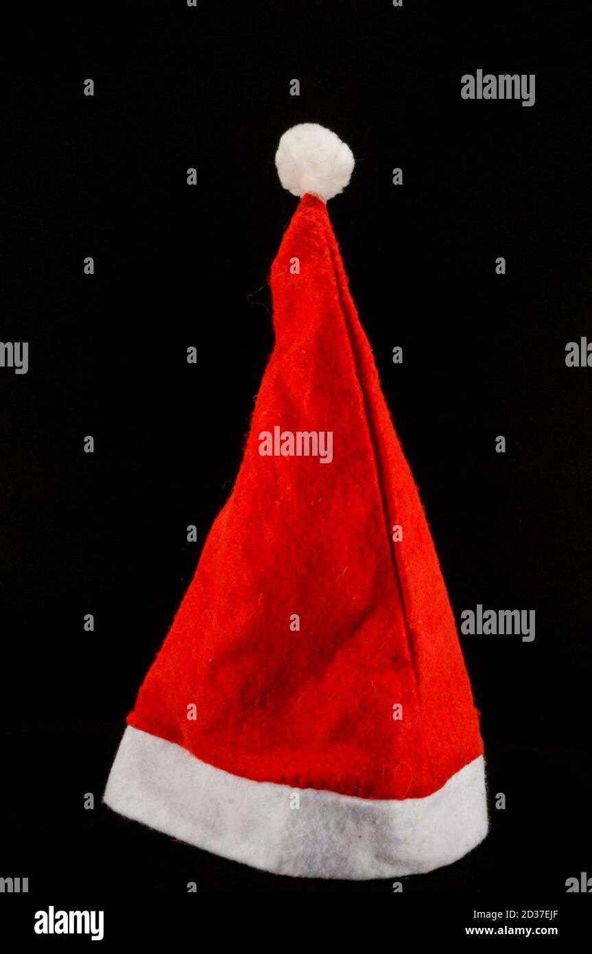 Santa Claus red hat isolated Stock Photo - Alamy
