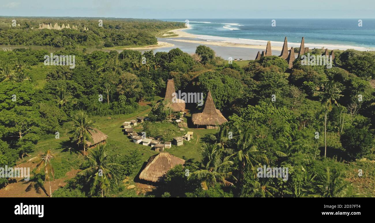 Picturesque village with traditional houses on sand coast of sea bay in ...