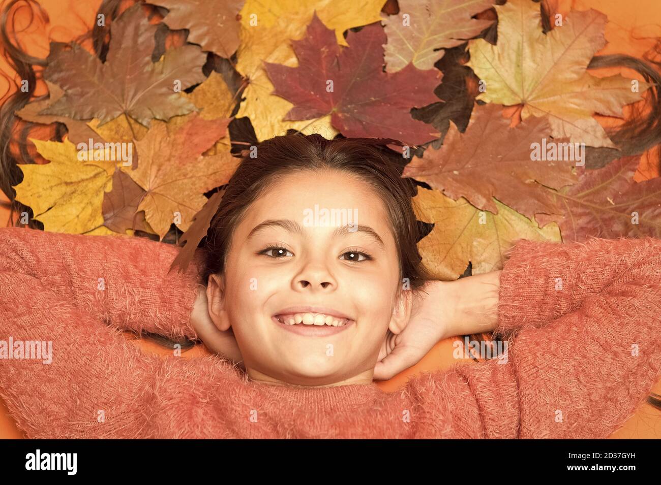 With smile on her lips. Happy smile of beauty model. Small child with ...