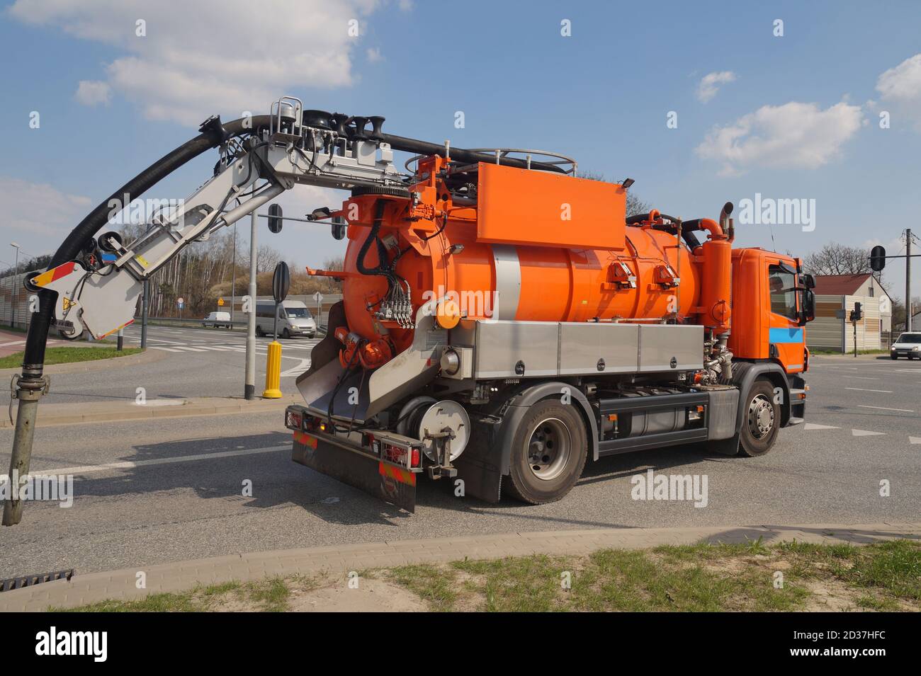 Cleaning sewer manholes. A specialized car on the street Stock Photo ...