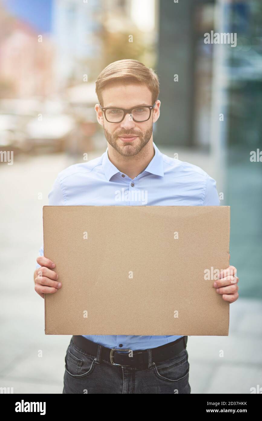 Standing holding looking protestor hi-res stock photography and images ...