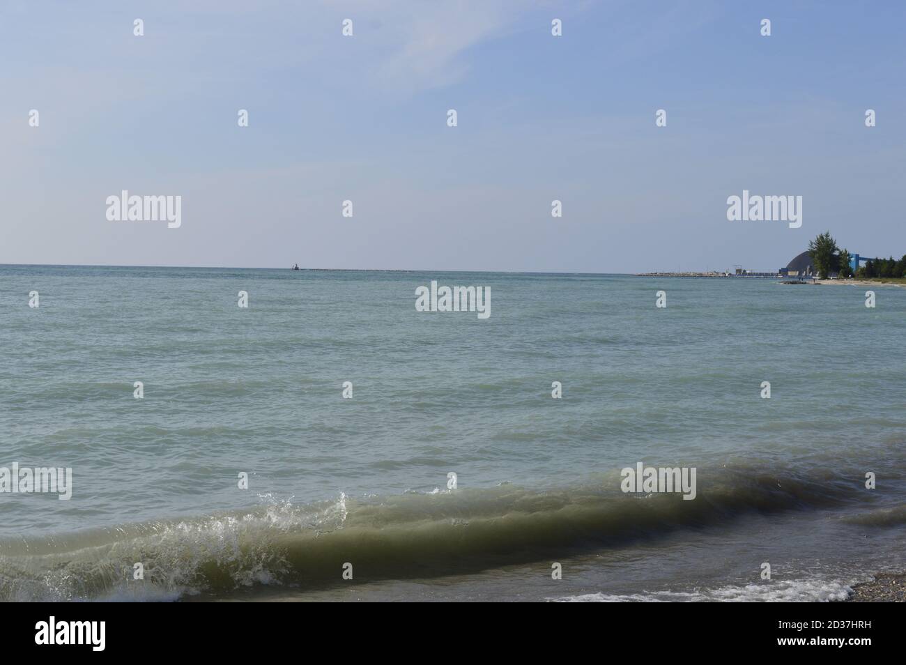 Sunny Day On The Beach Stock Photo - Alamy
