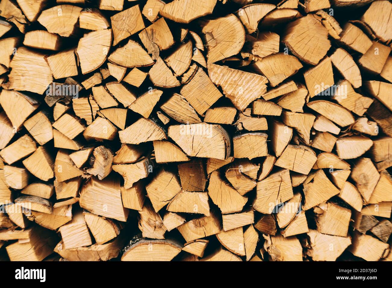 A stack of natural wooden logs prepared for the fireplace Stock Photo ...