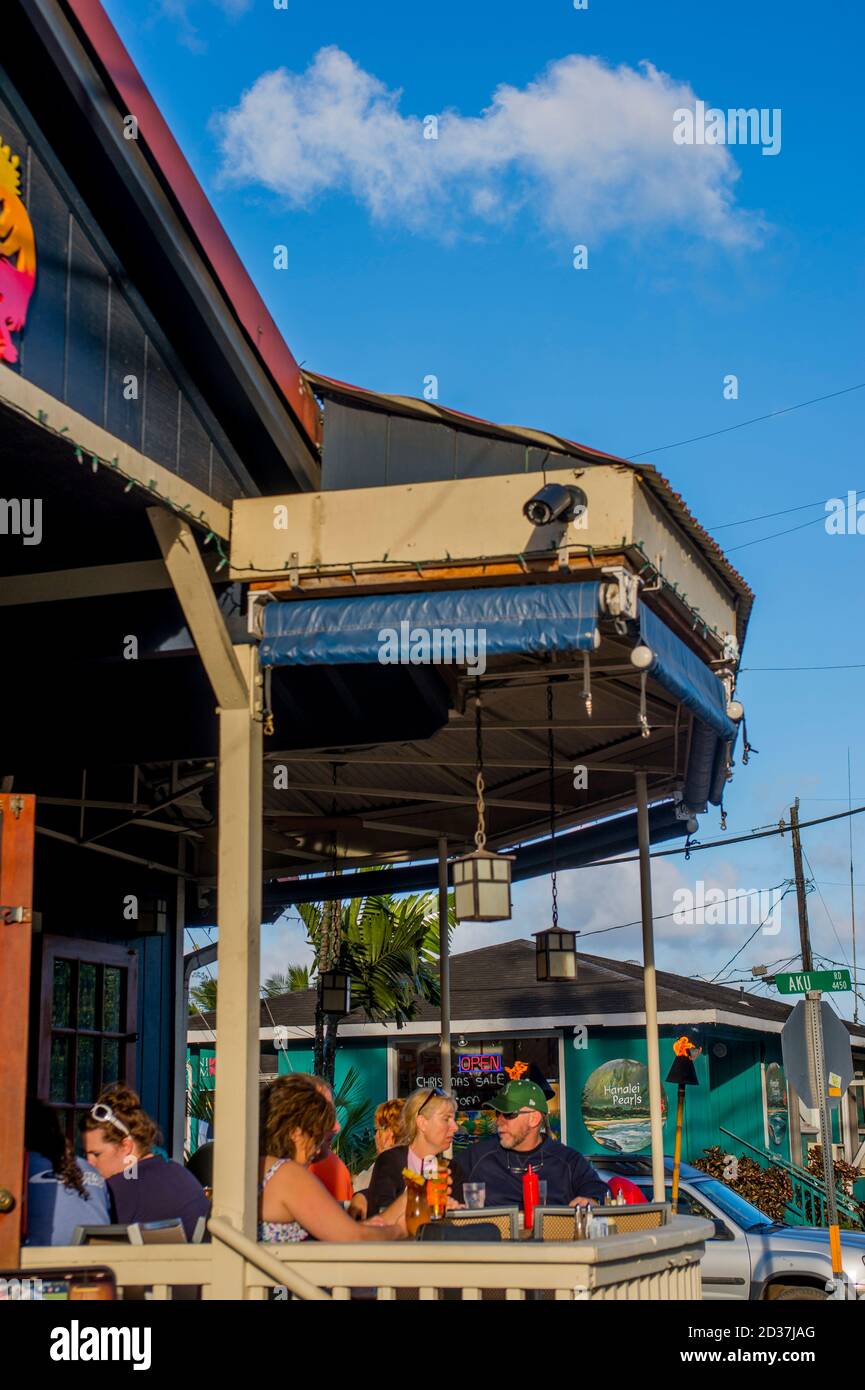 Street scene with people in restaurant in Hanalei on Kauai Island ...
