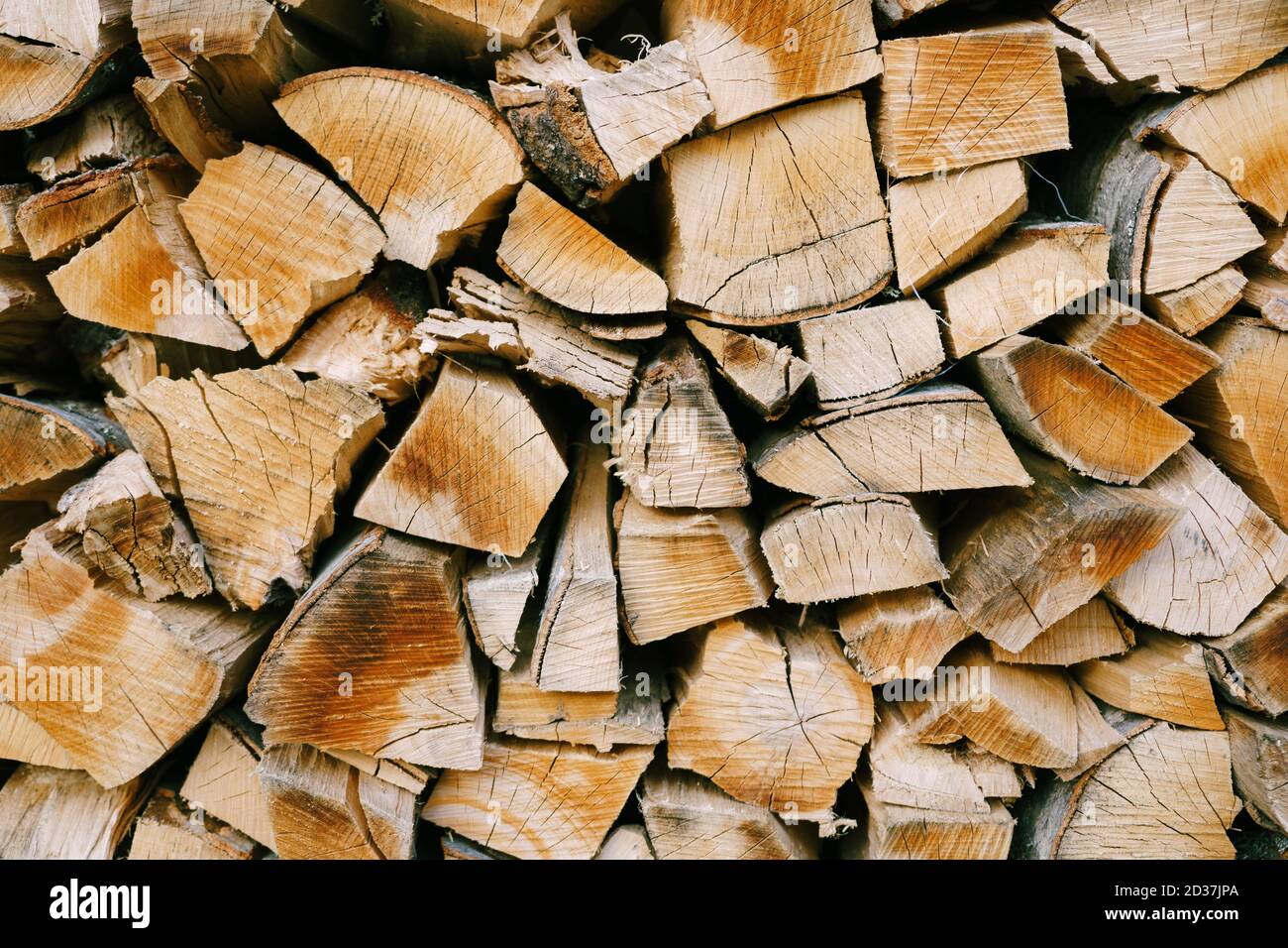 A stack of large wooden natural logs close-up Stock Photo - Alamy