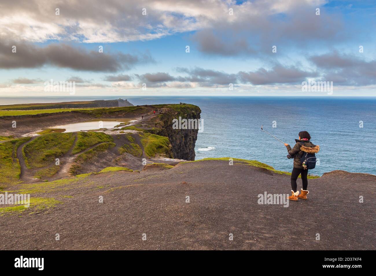 Cliffs of Moher, Burren Way, Ireland- 07 November 2015: People walking ...