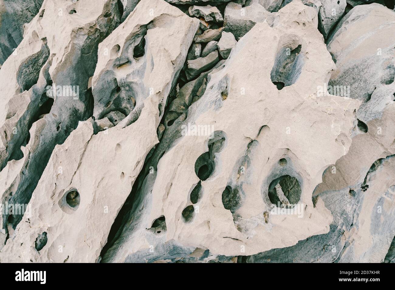 Sharp rocks with voids and holes on the Adriatic coast in Montenegro ...