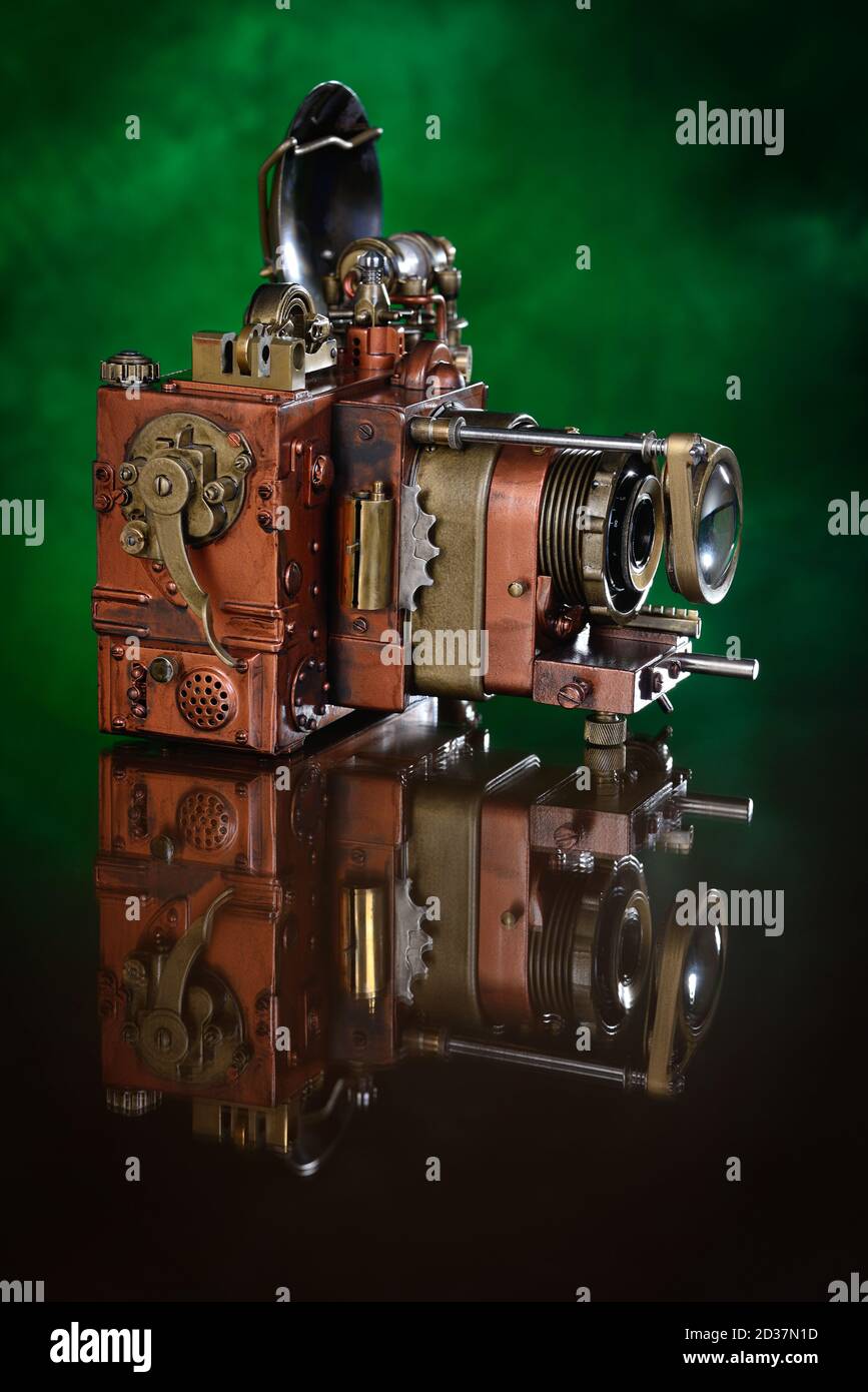Camera steampunk on a red background. Style Steampunk Stock Photo - Alamy