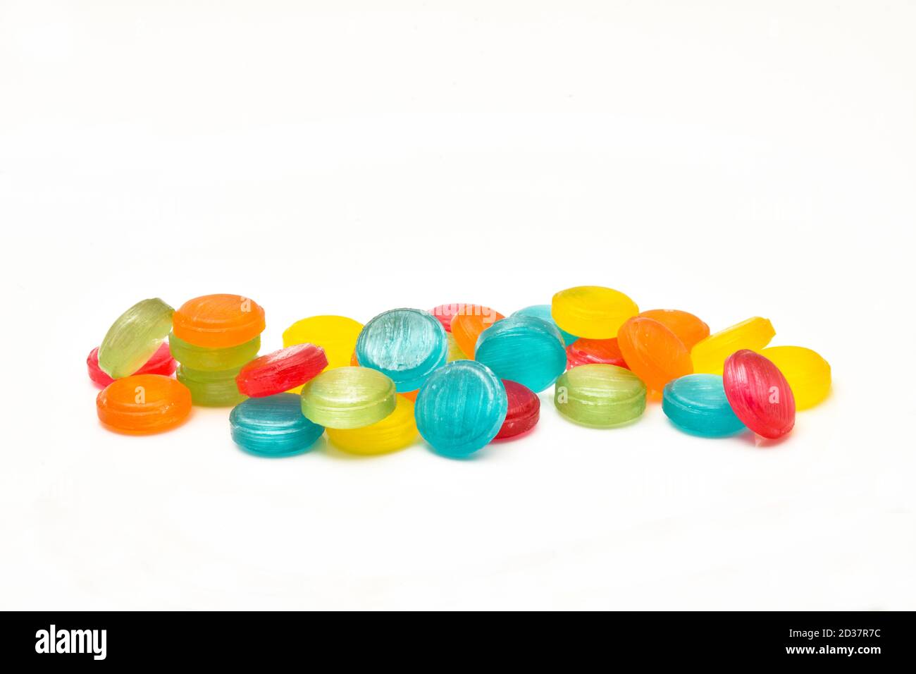 Different colored lozenges on a white background isolated Stock Photo ...