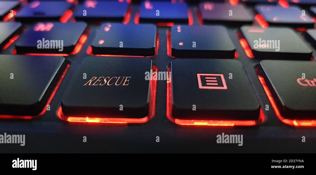 Black keyboard with red light and rescue text Stock Photo - Alamy