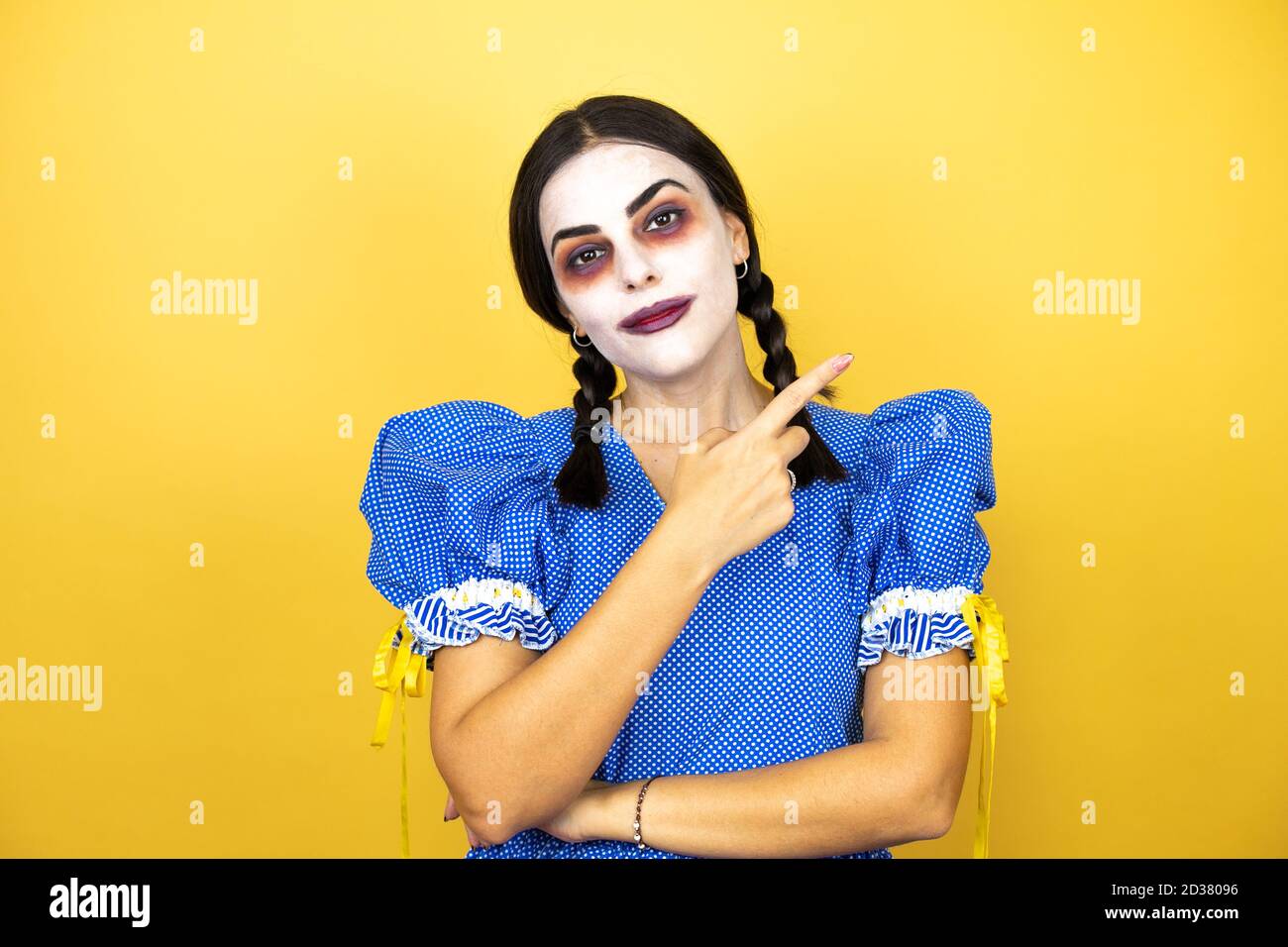 Woman hand pointing halloween sign hi-res stock photography and images ...